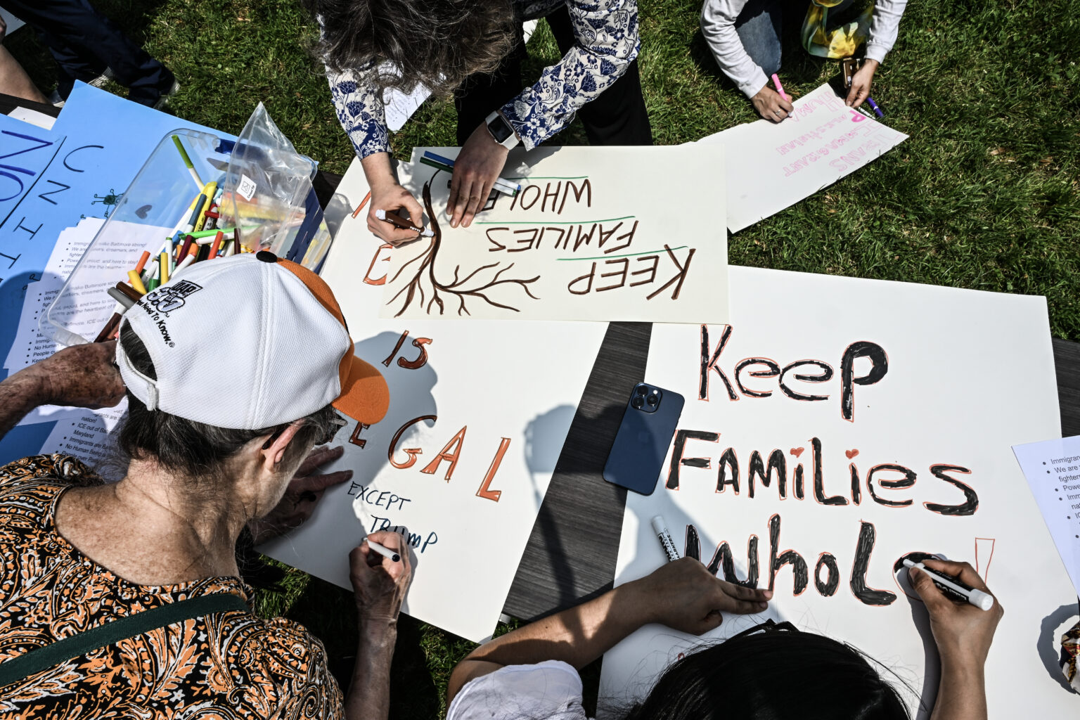 Photos: Hundreds Protest ICE Raids in Baltimore