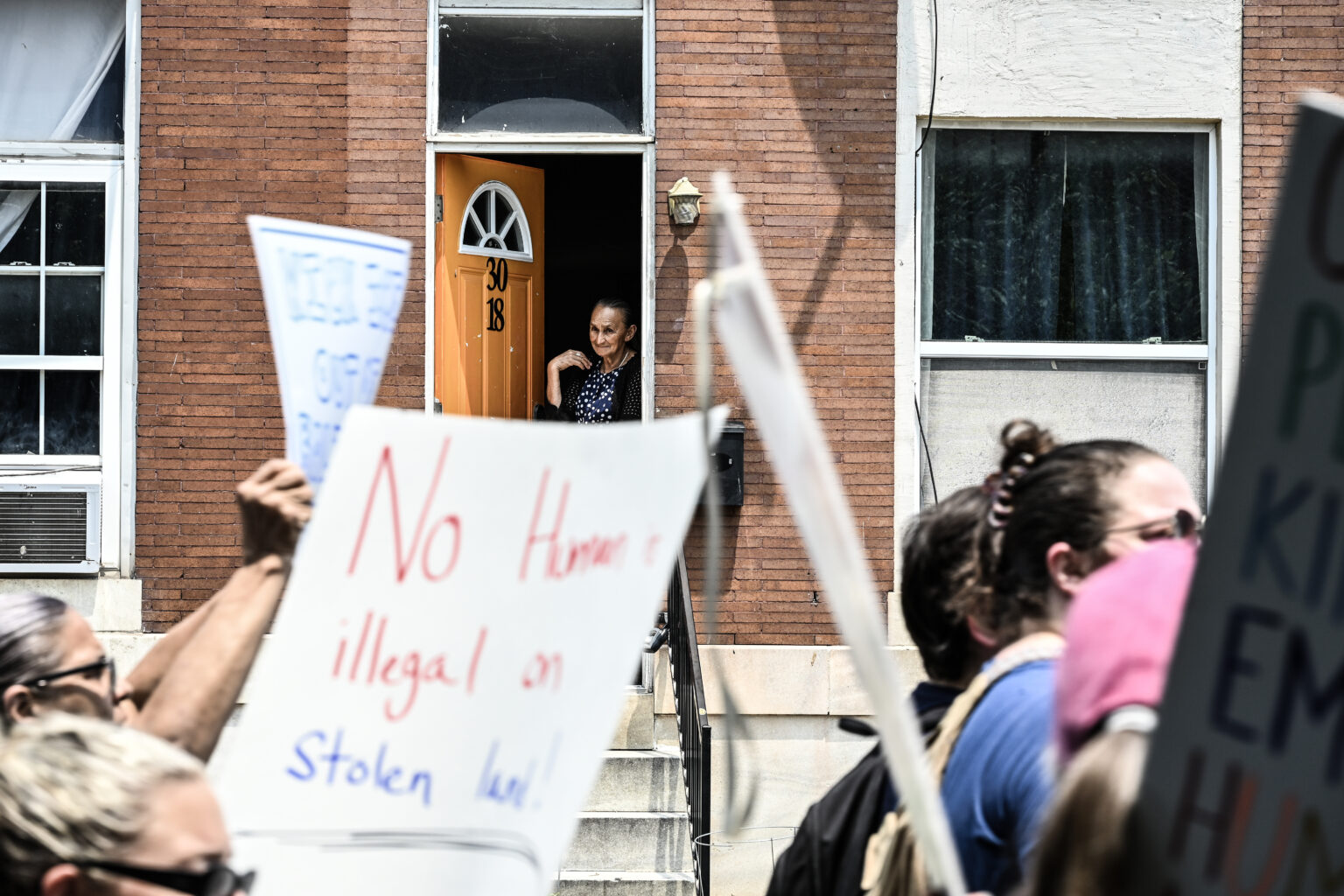 Photos: Hundreds Protest ICE Raids in Baltimore
