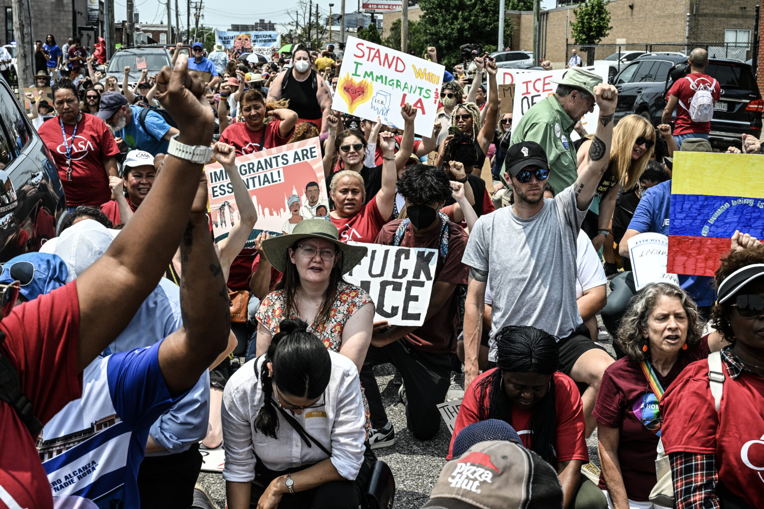 Photos: Hundreds Protest ICE Raids in Baltimore