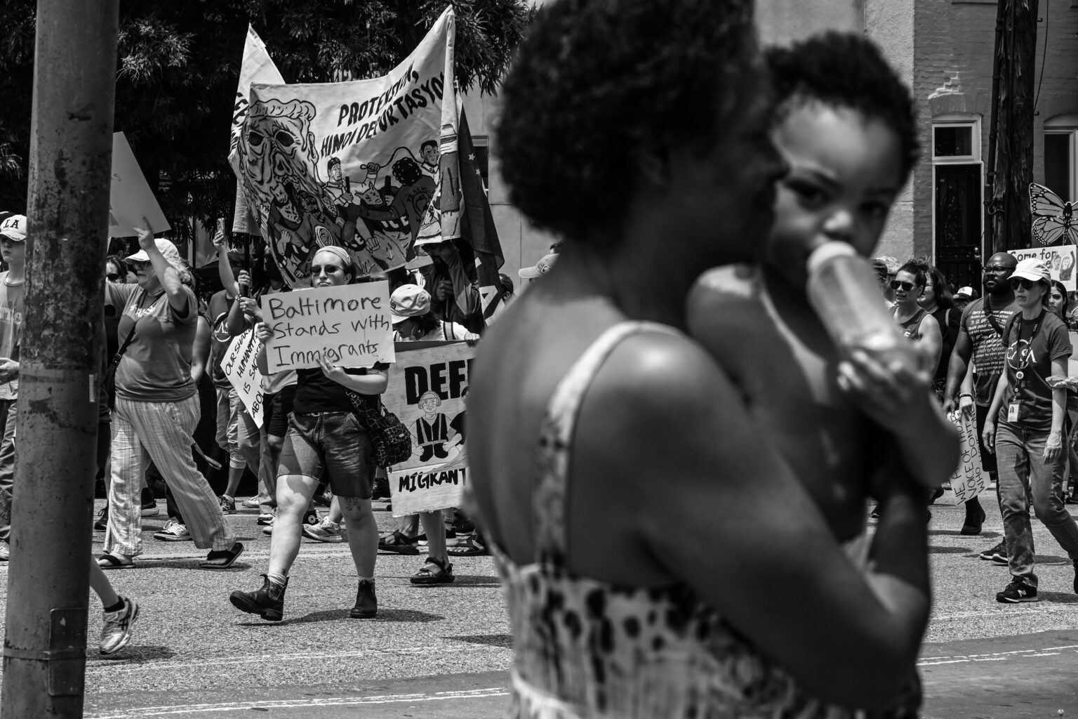 Photos: Hundreds Protest ICE Raids in Baltimore