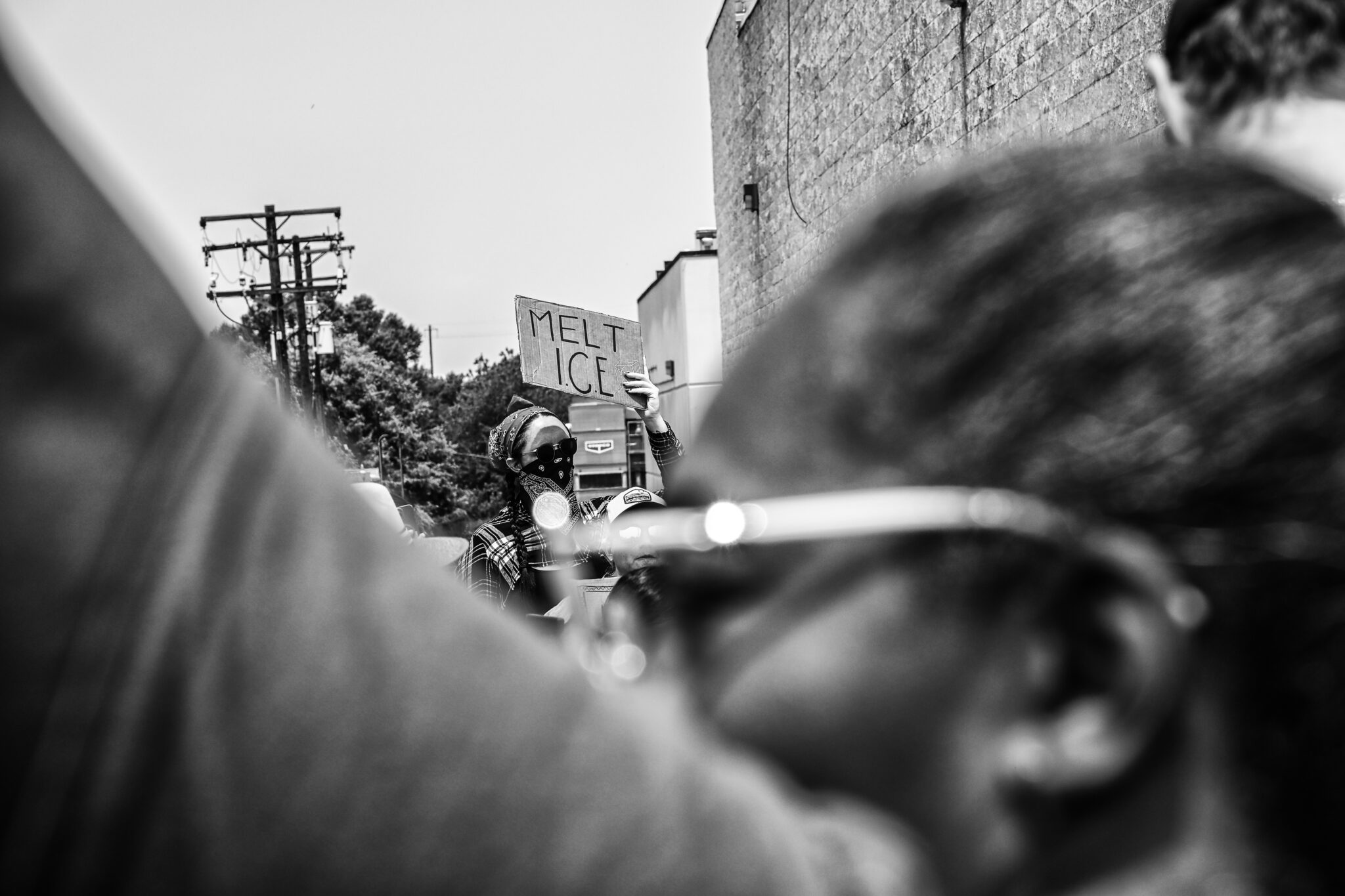 Photos: Hundreds Protest ICE Raids in Baltimore